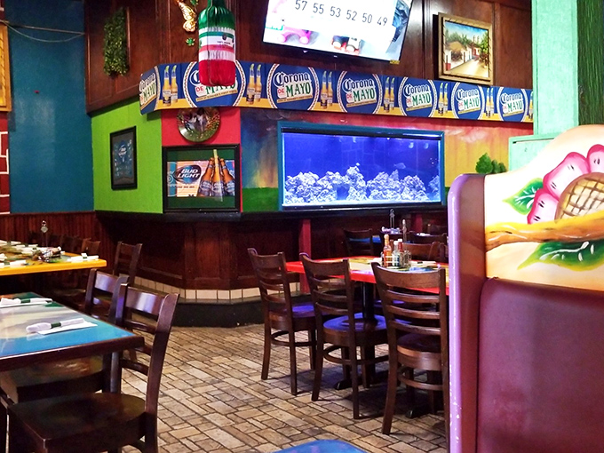 Inside, a kaleidoscope of colors greets hungry patrons, with the restaurant's signature aquarium adding a touch of serenity to the festive atmosphere.