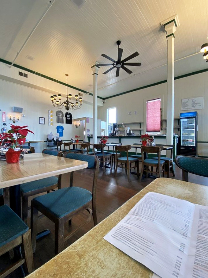 Inside, simplicity reigns supreme with wooden tables, ceiling fans, and poinsettias &ndash; proof that great seafood needs no architectural distractions, just room for the flavors to soar.