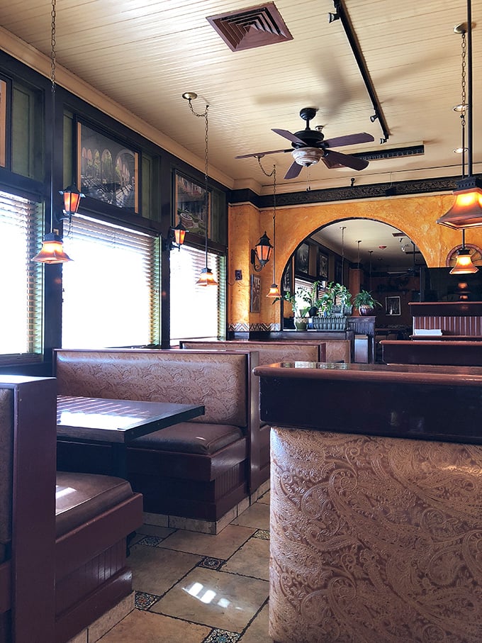 Warm terracotta walls and pendant lighting create that "where has this place been all my life?" atmosphere that invites lingering conversations.