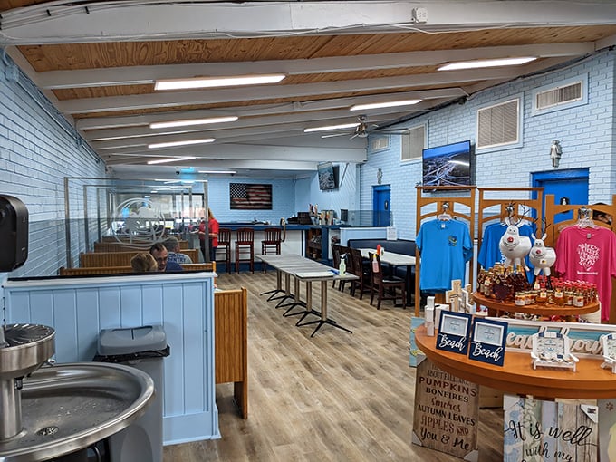Light blue walls and wooden ceiling beams create a coastal vibe inside, where comfort meets function in this unpretentious breakfast haven.