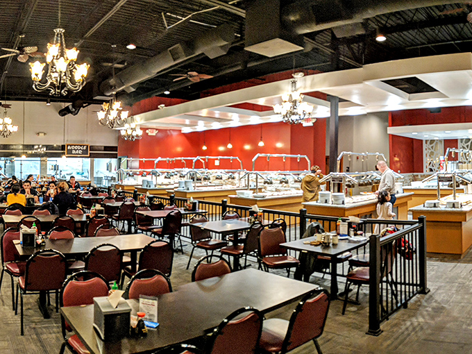 Elegant chandeliers hanging above a sea of tables create an unexpected touch of class. This isn't your average buffet&mdash;it's dinner theater with you as the star.