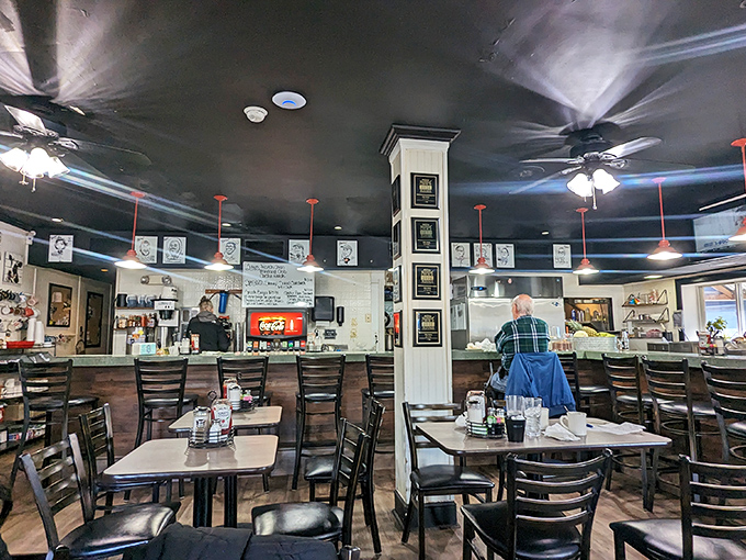 Inside, classic diner charm meets Maryland hospitality. The counter seating invites solo diners to become part of the Willy's family while watching culinary magic unfold.