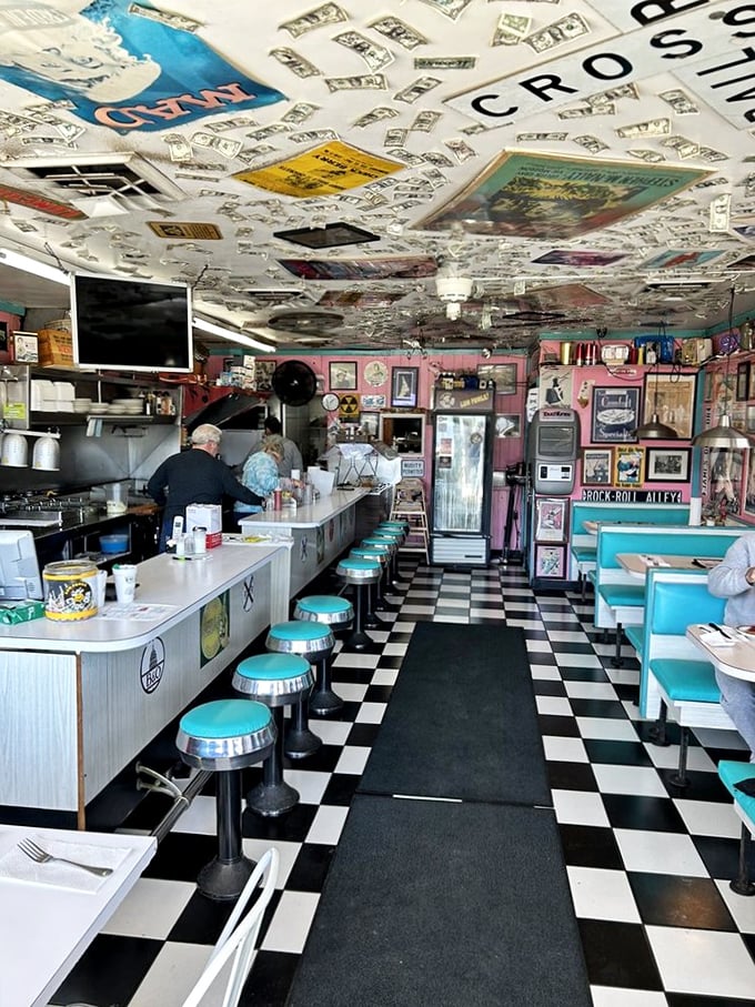 Step inside and the 1950s wrap around you &ndash; checkered floors, turquoise stools, and a ceiling plastered with memories. Nostalgia never tasted so good.