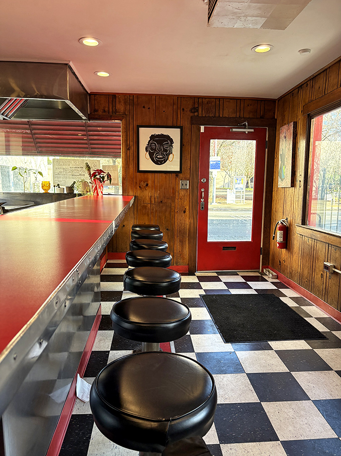 Counter culture at its finest. The classic checkerboard floor and cozy row of stools invite you to pull up a seat and join the burger brotherhood.