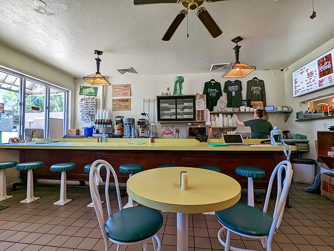 The classic diner-style interior with those signature green stools isn't trying to impress Instagram&mdash;it's too busy impressing your taste buds.