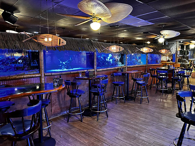 Dining under wooden fish lamps with aquariums glowing blue nearby isn't just ambiance&mdash;it's dinner and a show where the supporting cast has fins.