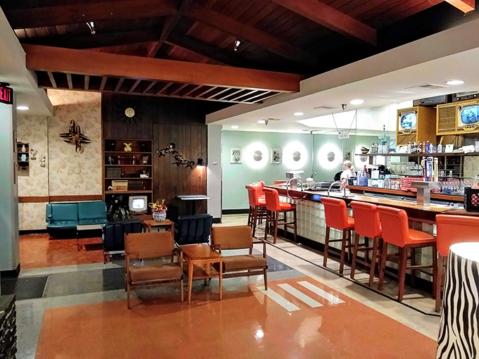 Step inside and suddenly you're in grandma's living room—if grandma had mint-green countertops and the coolest mid-century furniture collection.