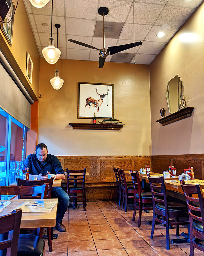Warm wood paneling and simple decor create the perfect canvas where breakfast masterpieces take center stage.