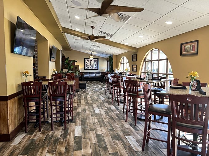 Inside, warm wood tones and arched windows create that perfect "I'm on vacation" feeling, even if you're just playing hooky from work.