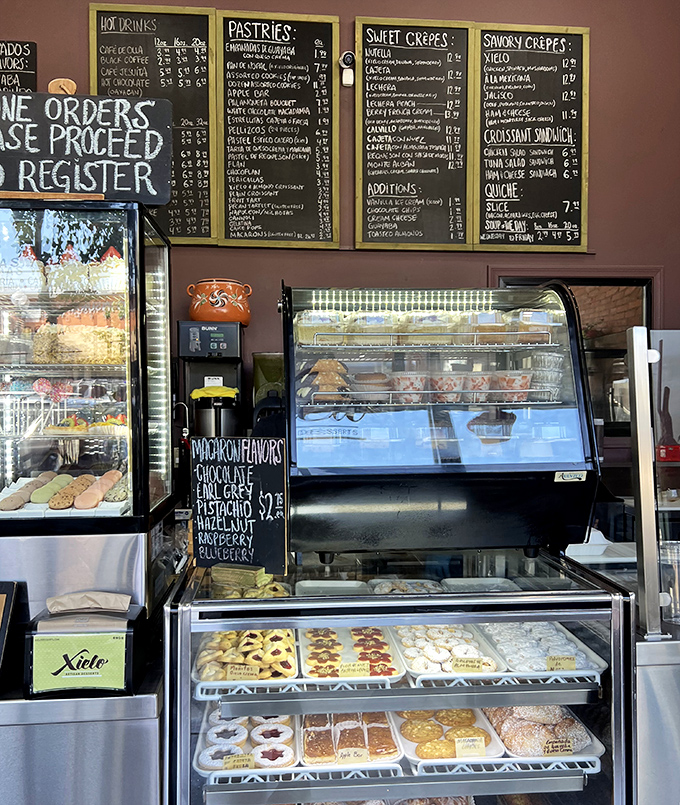 Chalkboard menus and gleaming display cases create that perfect balance of artisanal charm and mouthwatering anticipation.