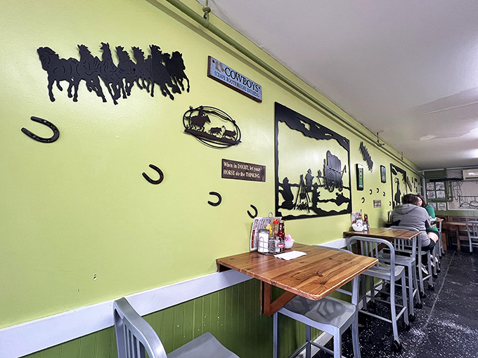 Western charm meets island hospitality. The Chuckwagon's lime-green walls adorned with silhouettes of horses and wagons create the perfect backdrop for breakfast bliss.