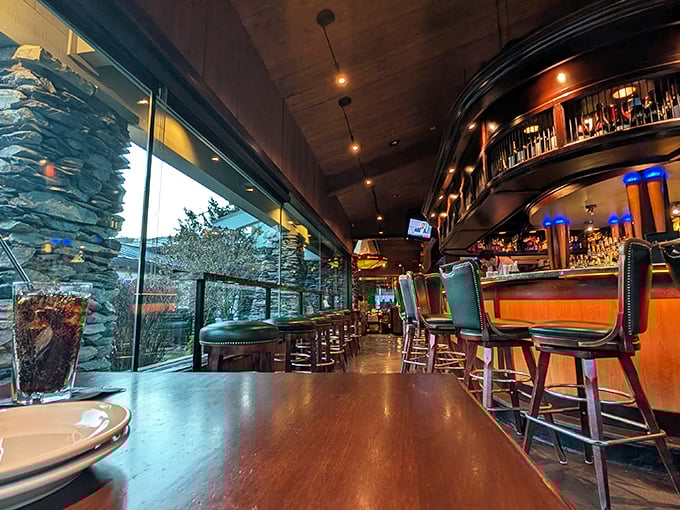 Where mountain charm meets modern elegance. The curved bar beckons with the silent promise that whatever happened on your hike stays at the bar.