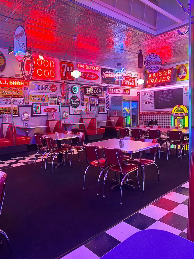 Step inside and the neon glow bathes everything in nostalgic light. This isn't manufactured nostalgia; it's the real deal, preserved like a perfectly carbonated soda. 