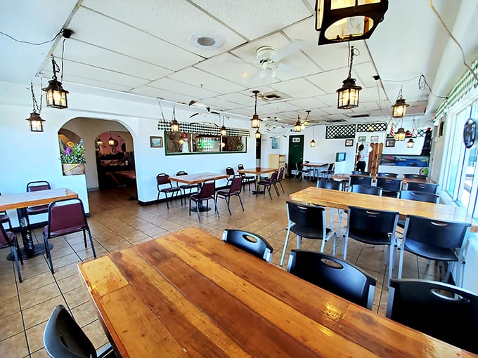 Lantern-lit simplicity creates the perfect backdrop for seafood feasting, where wooden tables have witnessed countless "that's the best I've ever had" moments.