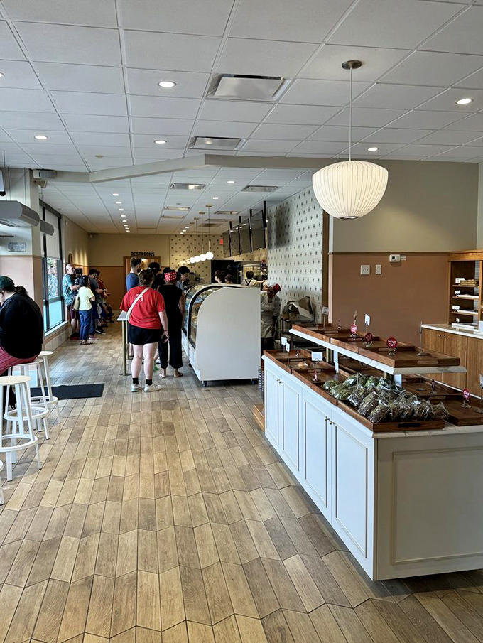 The line forms for good reason&mdash;this isn't just another bakery. Wood floors, paper lanterns, and display cases filled with edible art create a space worth waiting for.