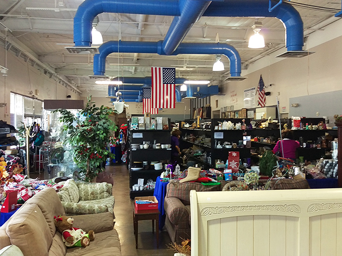 Blue ductwork and American flags create an unexpectedly patriotic backdrop for this treasure trove. Somehow, even industrial piping looks charming here.