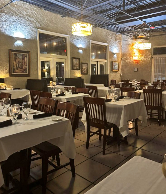 White tablecloths and warm lighting create the perfect backdrop for romance, celebration, or simply Tuesday's dinner when you deserve better than leftovers.