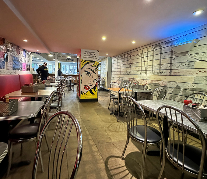 Pop art meets comfort food in this diner-inspired interior. The blonde in the comic art seems to be thinking what we're all thinking: "I should have ordered seconds."