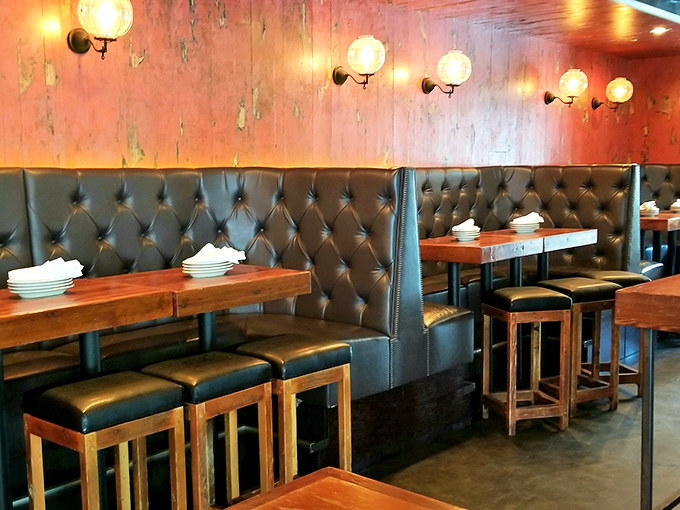 Leather-tufted booths invite lingering conversations and strategic meal planning. "I'll trade you a bite of my chicken for your mac and cheese" negotiations happen here daily.