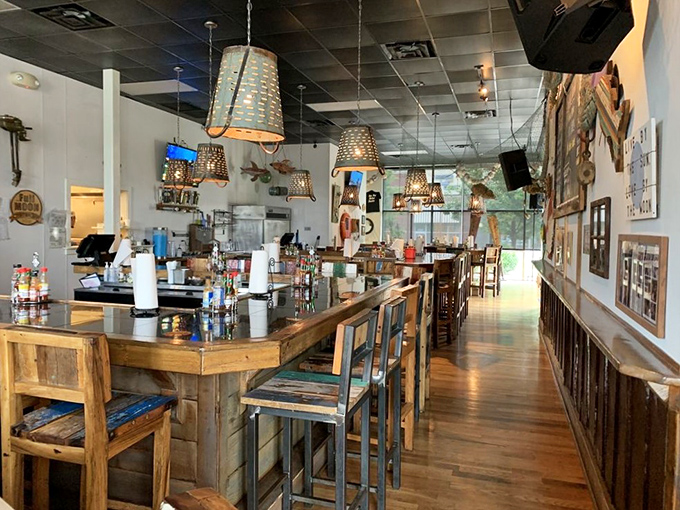 The horseshoe-shaped bar isn't just clever design&mdash;it's seafood theater where every seat gets a front-row view of culinary magic.