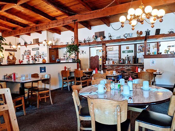 Wooden beams, warm lighting, and decades of breakfast memories create the kind of cozy atmosphere that makes you want to linger over that third cup of coffee.
