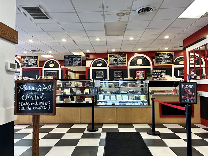 Step inside to a classic black and white checkered floor that practically whispers, "Yes, we take our desserts seriously around here."