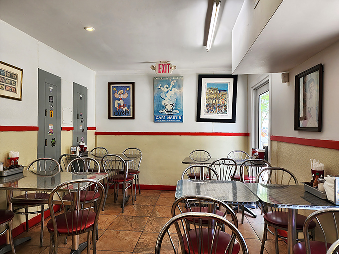 No-frills dining room where Cuban coffee flows freely and conversations bounce between Spanish and English like a well-played game of dominoes.