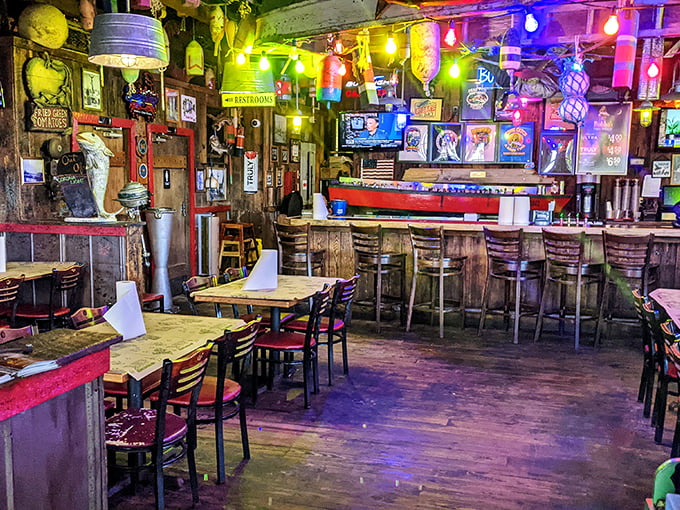 Step inside and you're greeted by a kaleidoscope of colorful string lights, weathered wood, and nautical treasures&mdash;like a pirate's hideout that serves hushpuppies.