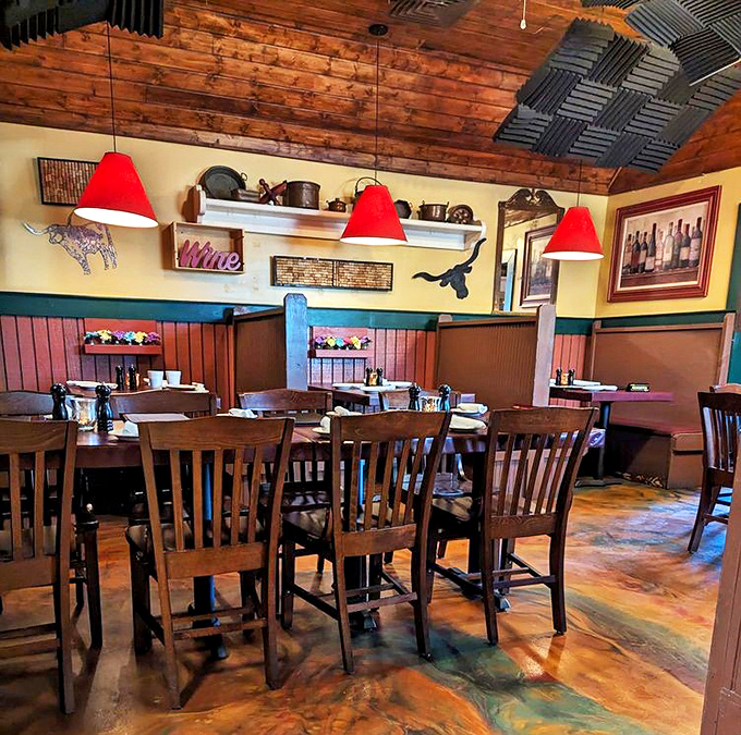 Wooden beams, red pendant lights, and that rustic ceiling create the perfect atmosphere for serious eating&mdash;comfort doesn't always need to whisper.