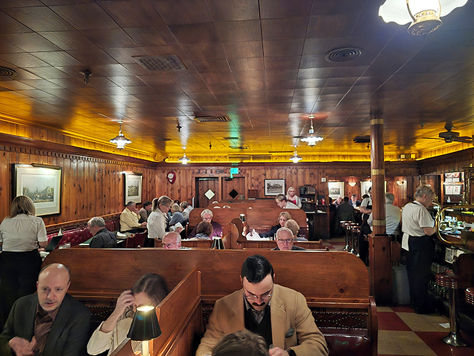 Step inside and time stands deliciously still. Wood-paneled walls, intimate booths, and the quiet hum of satisfaction&mdash;this is dinner as it should be.