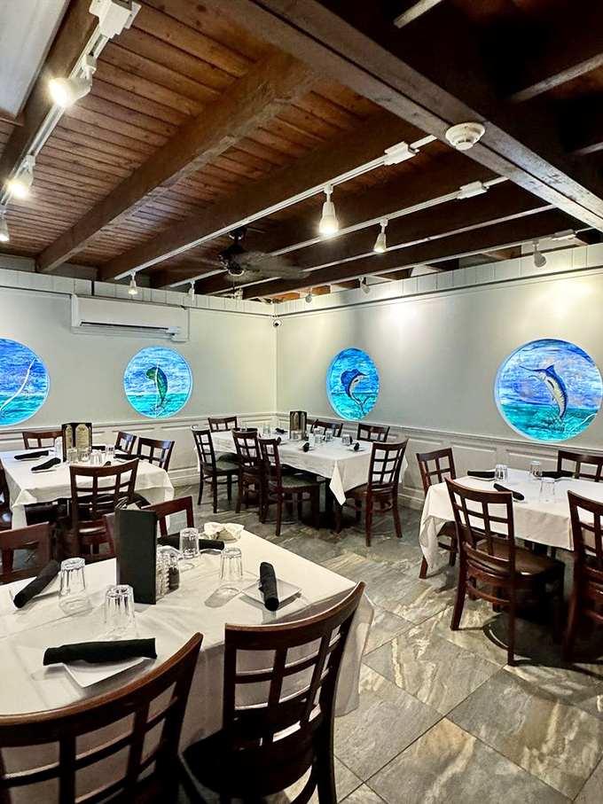 Step inside and you're greeted by porthole windows featuring stunning marine life murals that make you feel like you're dining under the sea.