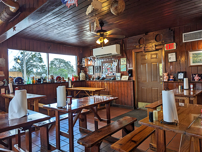 Wood-paneled walls and paper towel rolls tell you everything you need to know—this place prioritizes substance over style.