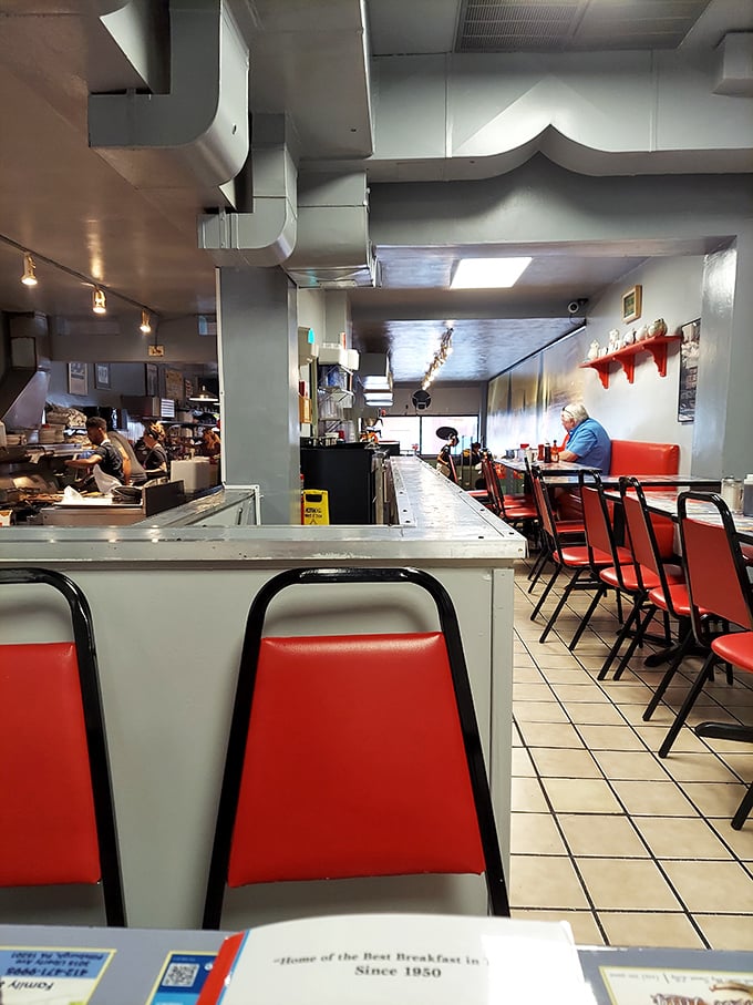 Classic diner aesthetics with those cherry-red vinyl seats where countless Pittsburghers have contemplated life over coffee and eggs.