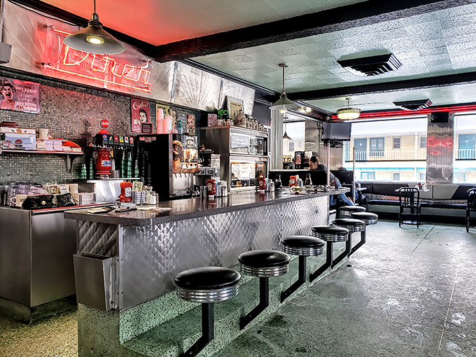 Counter culture at its finest—where spinning stools promise stories, refills flow freely, and strangers become temporary family over hash browns.