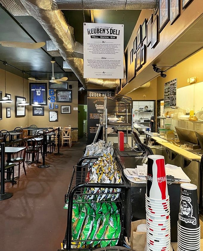 Inside Reuben's, the "YELL. WATCH. EAT." philosophy isn't just signage&mdash;it's the authentic deli experience that transports you straight to Manhattan.