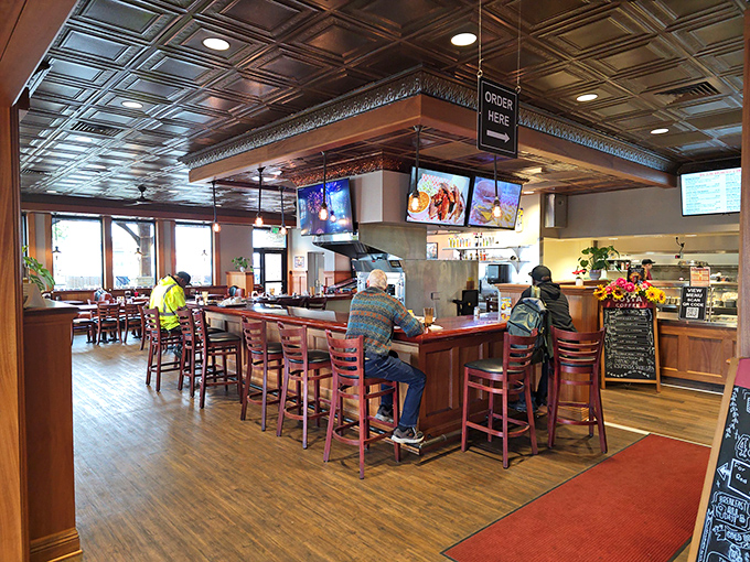 The counter seats aren't just furniture; they're front-row tickets to the greatest breakfast show in Sacramento, complete with sizzling griddles and friendly banter.