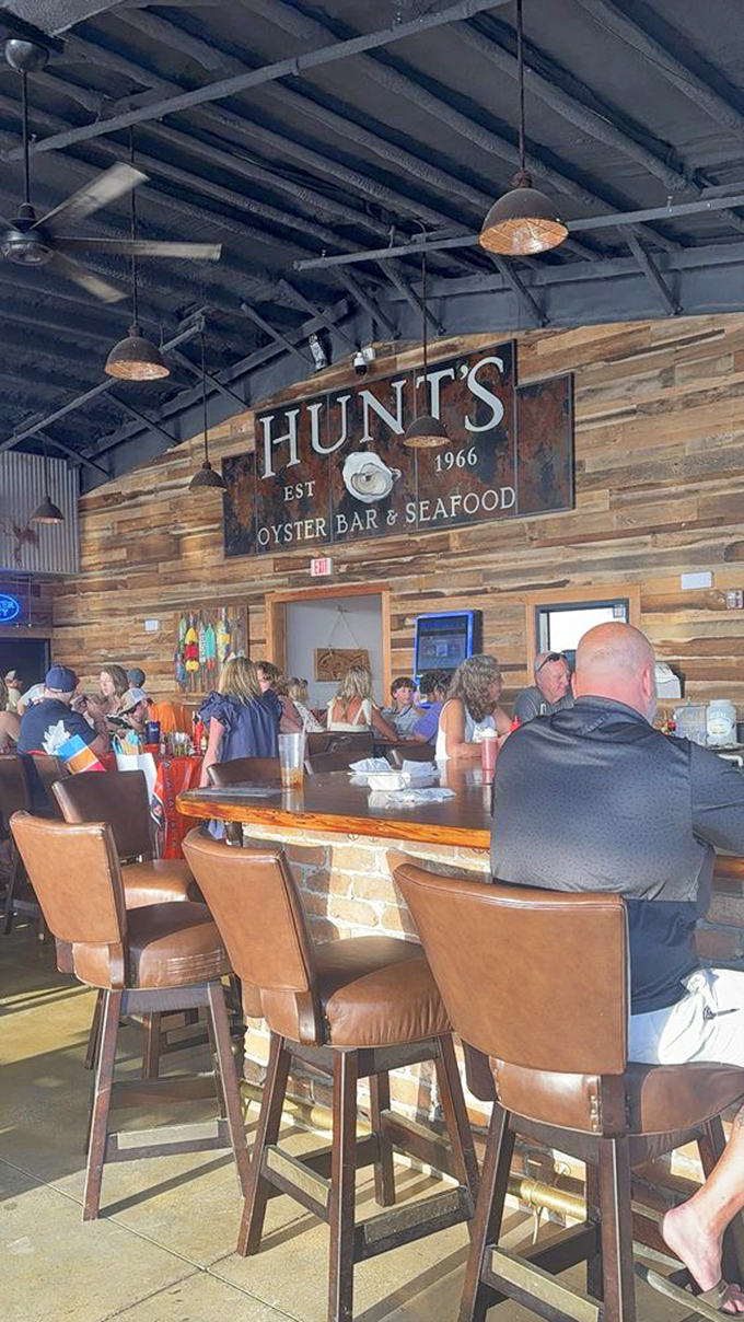 Inside Hunt's, rustic wood paneling and a bustling bar create that perfect "I've discovered something special" atmosphere that makes seafood taste even better.