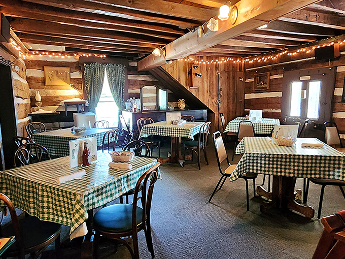 Log cabin walls and checkered tablecloths tell you everything about Stroud's priorities: comfort, tradition, and zero pretension.