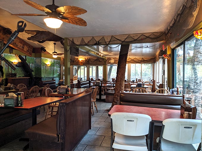 Where fishing nets meet ceiling fans. The interior embraces its "fish camp chic" aesthetic with unapologetic enthusiasm, creating an atmosphere as comforting as grandma's kitchen.