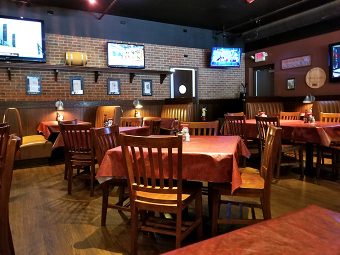 Cozy booths, warm lighting, and exposed brick create that "Cheers" vibe where everybody might not know your name yet, but they'll remember your order.