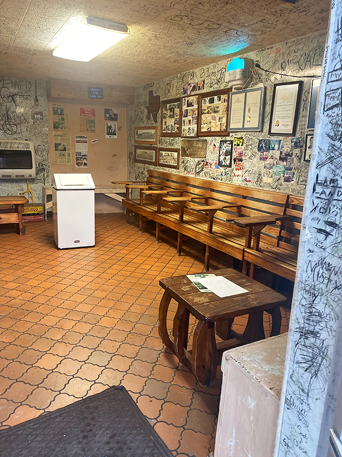 Walls that tell a thousand stories. Every signature represents someone who made the pilgrimage to burger paradise and lived to tell the tale.