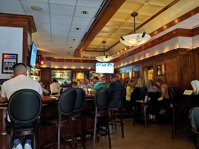 The bar at Mo's buzzes with the energy of deal-makers and date-nighters, where martinis are shaken and conversations flow as smoothly as the top-shelf spirits.