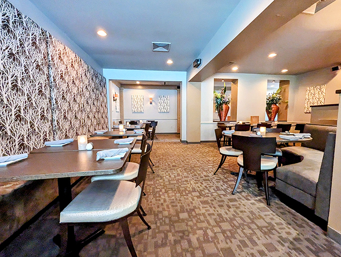 Where pattern meets purpose &ndash; the dining room's distinctive wall coverings aren't just decoration, they're conversation starters that keep you talking until the food arrives.