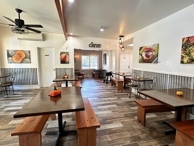 Rustic wood tables, corrugated metal accents, and that "dine" sign that's less suggestion, more delicious command. The interior practically whispers, "Stay awhile."