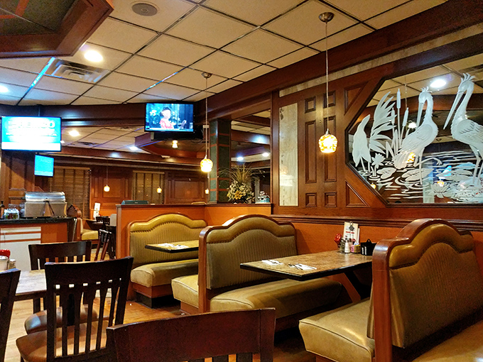 Wood paneling, golden booths, and etched glass dividers &ndash; this isn't just a diner, it's a time machine with better coffee and no complicated controls. 