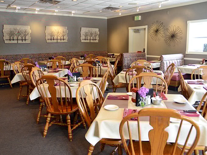 Classic Windsor chairs and white tablecloths set the stage for culinary magic. This isn't trendy dining&mdash;it's timeless comfort where memories are made between bites. 