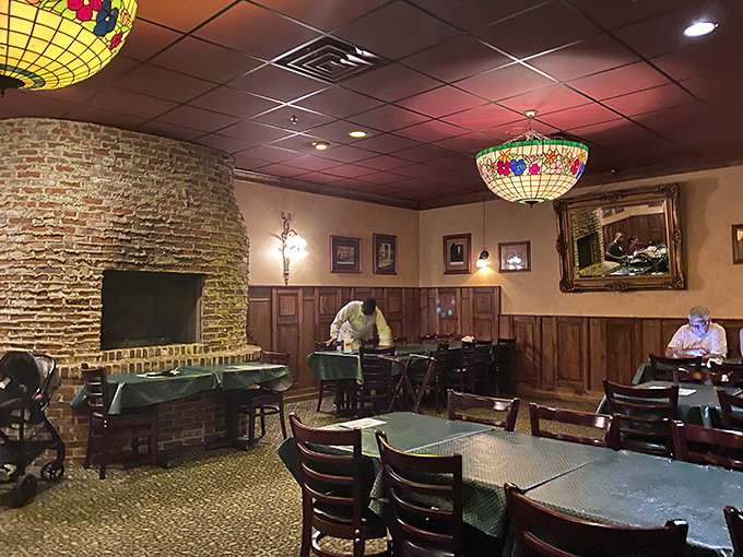 Classic red-checkered tablecloths and wood paneling create that "I've just walked into my Italian grandmother's dining room" feeling.
