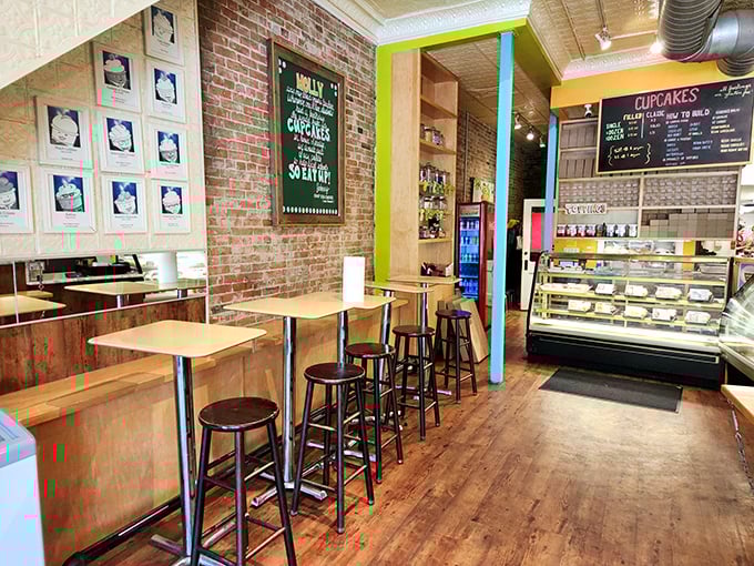 Exposed brick walls, wooden tables, and colorful accents create a space that feels like your coolest friend's apartment&mdash;if that friend happened to be a master baker.