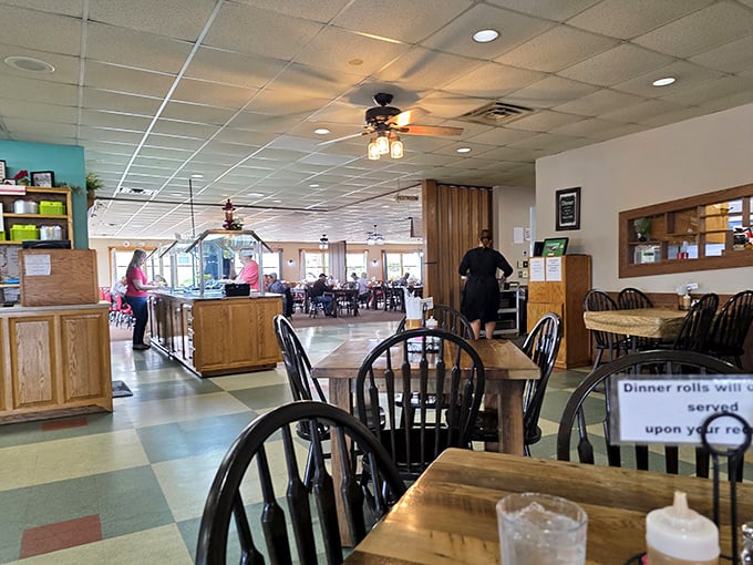 Step inside and the eclectic interior reveals itself&mdash;tin ceilings, wooden booths, and murals that make eating here feel like dining in an art gallery.