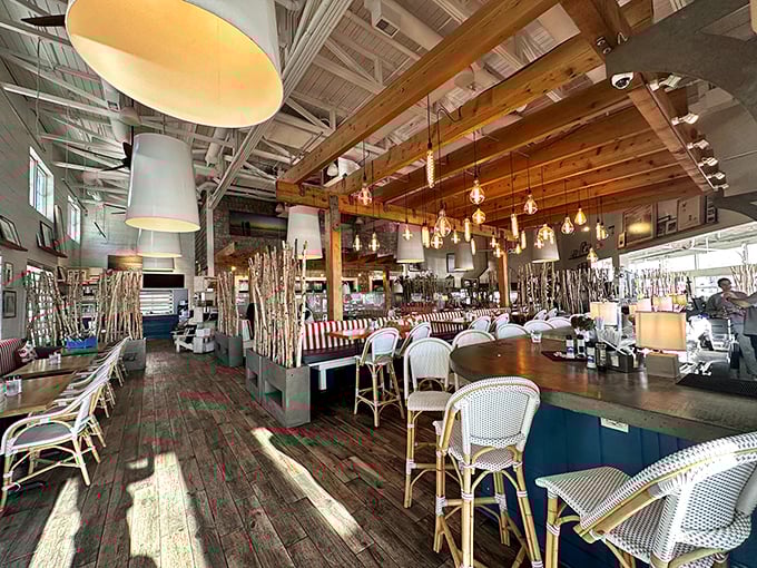 Rustic wooden beams meet modern design in a space where Lake Erie's natural beauty becomes part of the dining experience. Sunshine included at no extra charge.